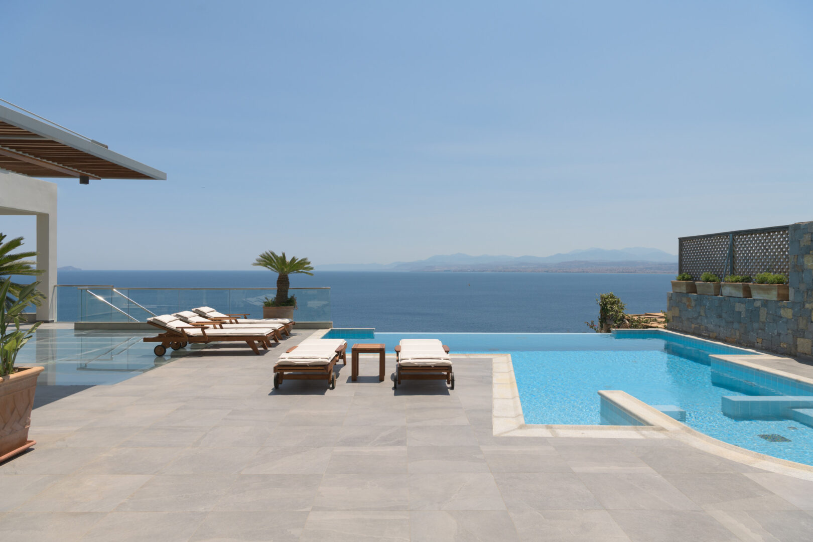 Villa Candia Lux, a Serene Cliffside Beach Retreat | Think Villa