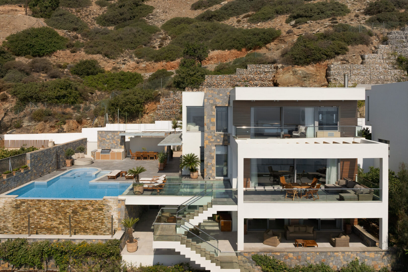 Villa Candia Lux, a Serene Cliffside Beach Retreat | Think Villa